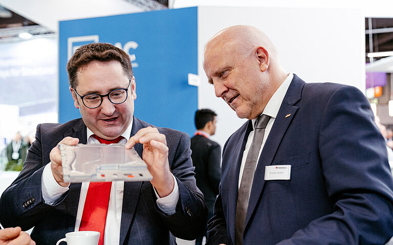 State Secretary visits the Grenzebach booth at EUROGUSS 2024